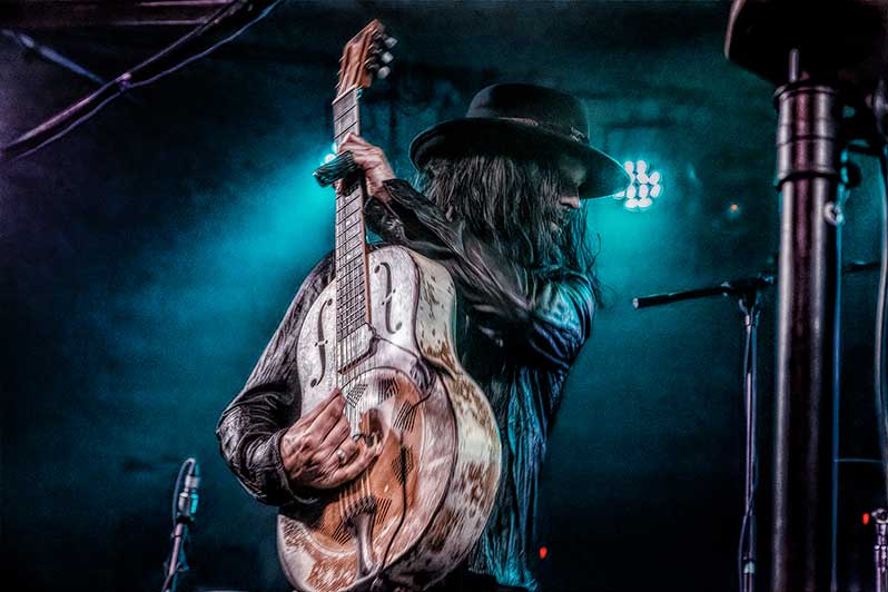 Troy Redfern signs a deal with Ernie Ball as he heads off on tour.